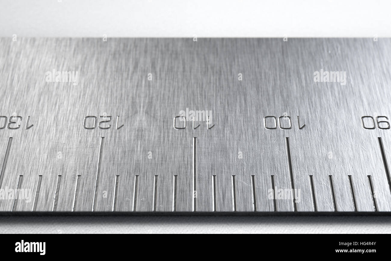 A 3D render of a close up view of a section of a steel ruler with ...