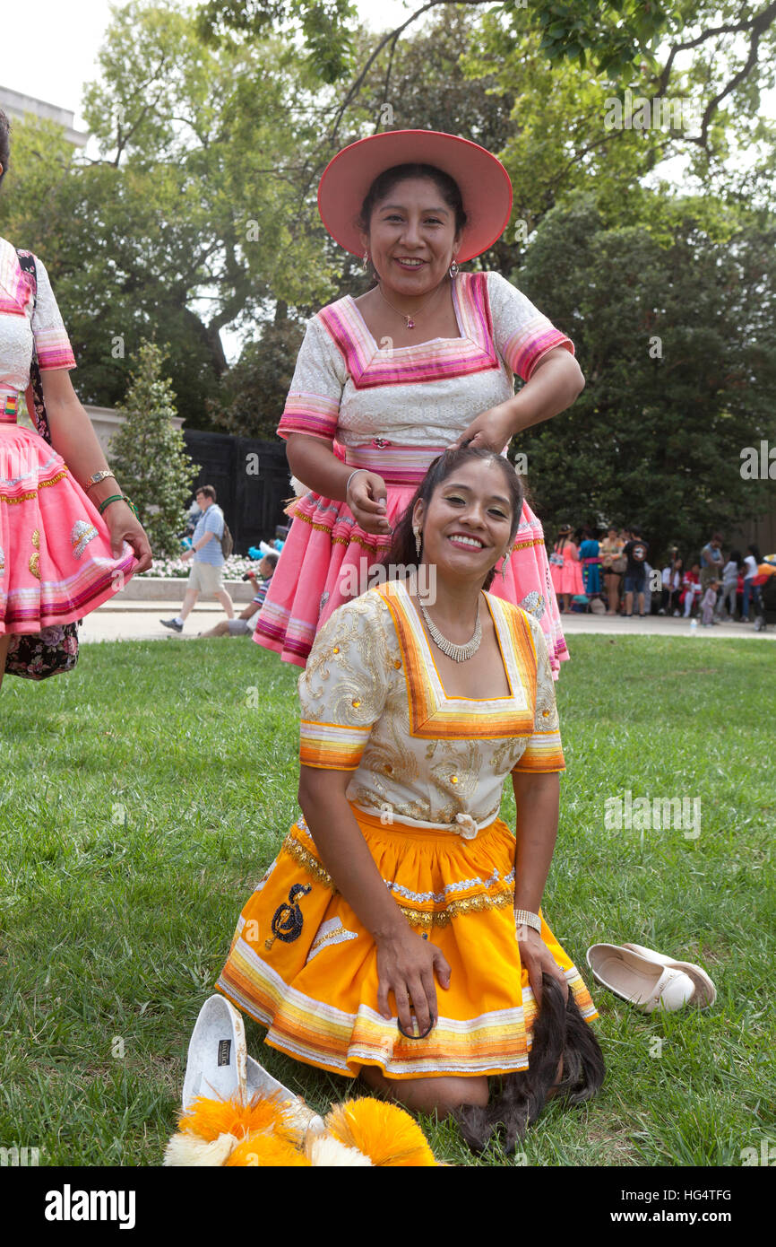 Traditional Peruvian dancers preparing for parade at Latino festival ...