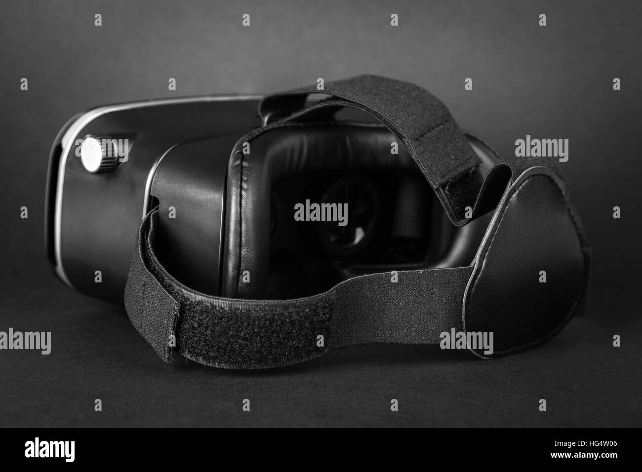 Virtual reality headset on black background Stock Photo - Alamy