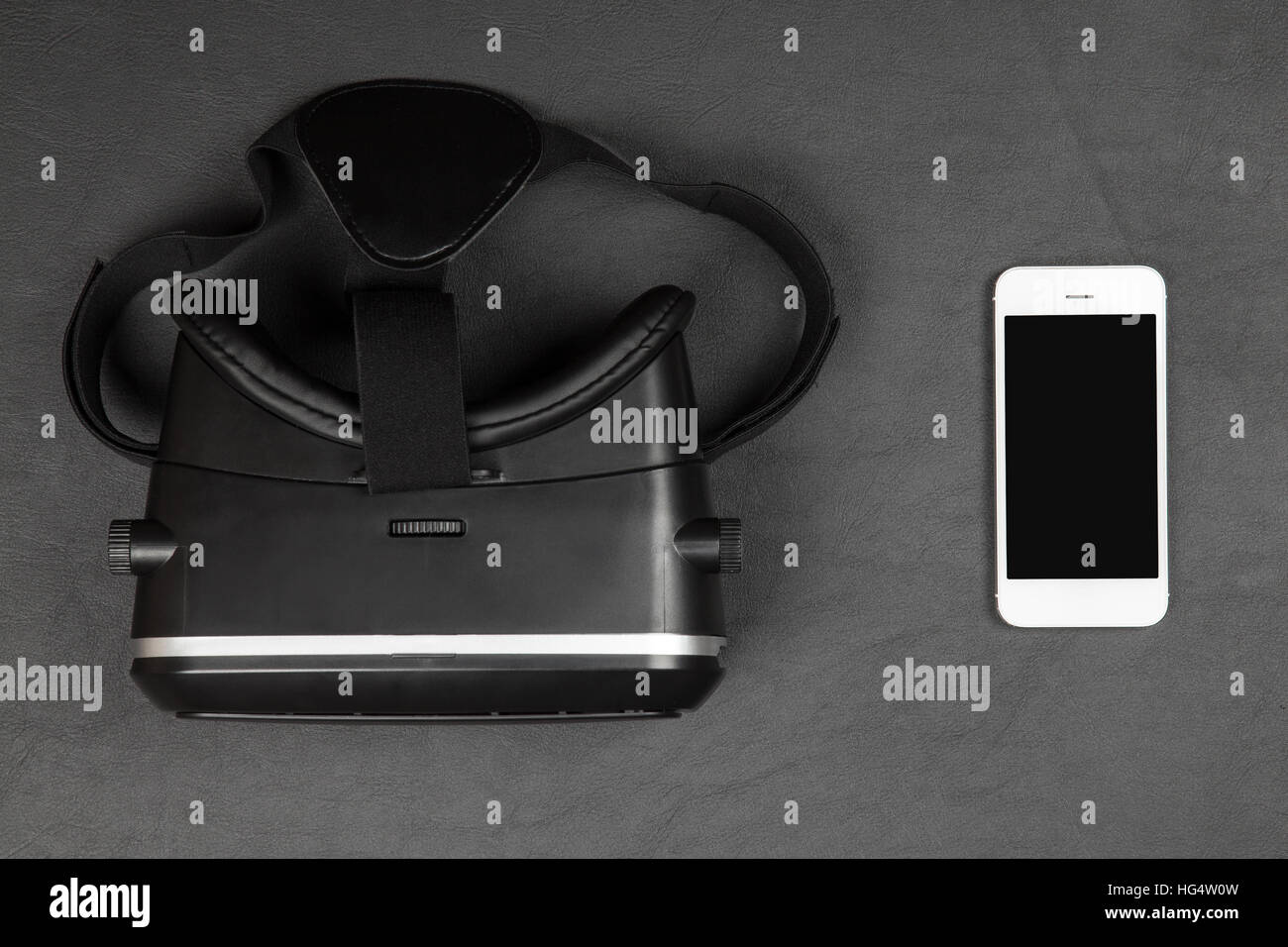 Virtual reality headset on black background Stock Photo - Alamy