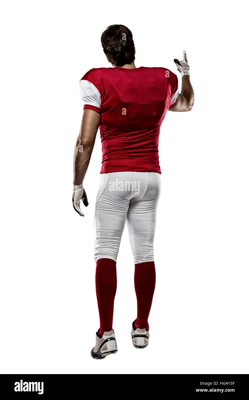 Football Player with a red uniform walking, showing his back on a white ...