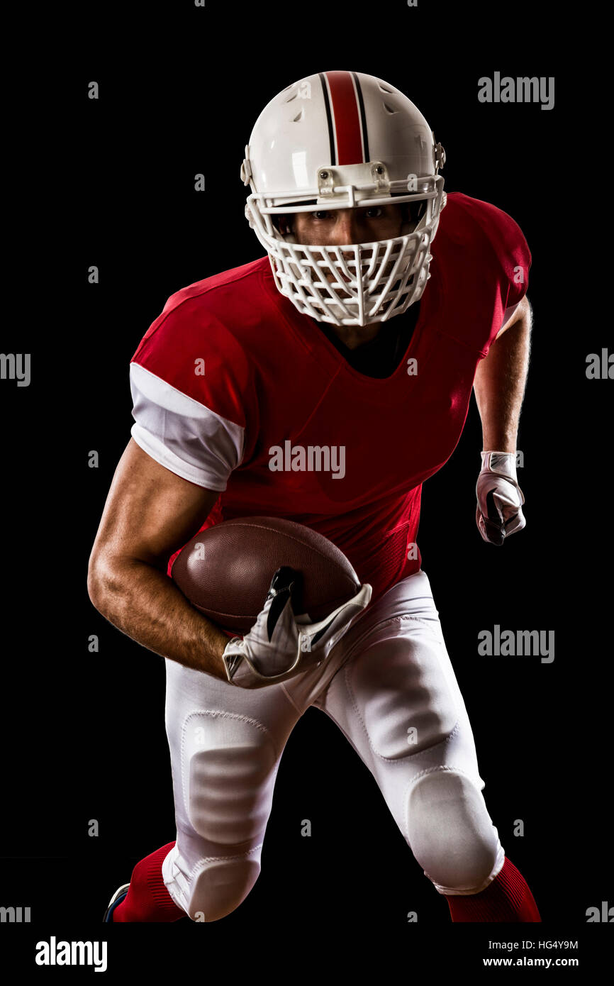 Football Player with a red uniform Running on a Black background Stock ...