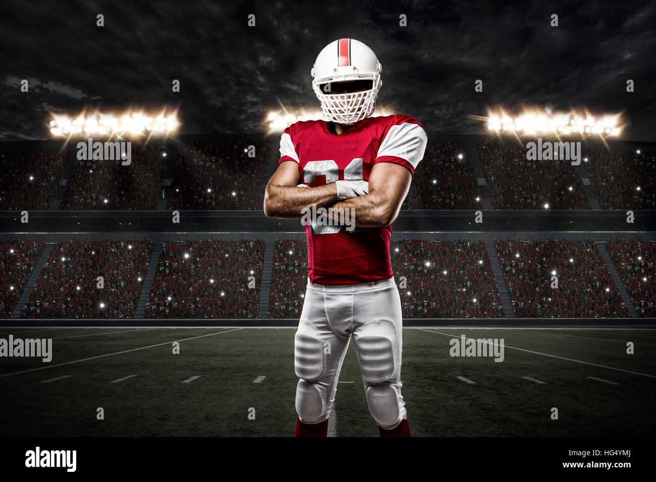 Football Player with a red uniform on a stadium Stock Photo - Alamy
