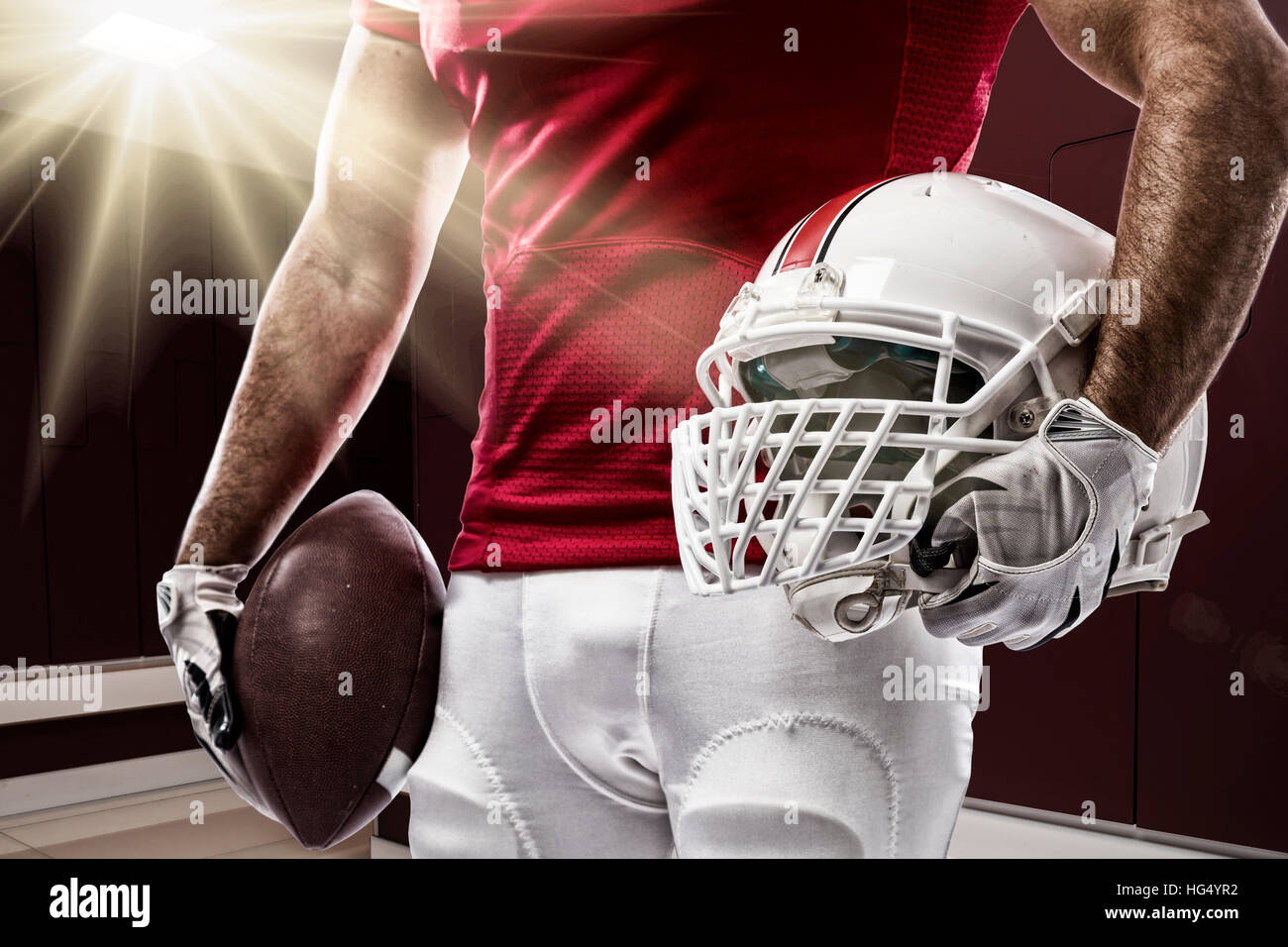 Football Player with a red uniform on a Locker roon Stock Photo - Alamy