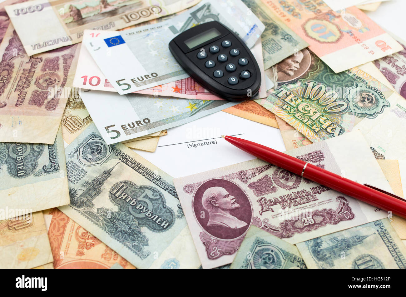 The photo of old Russian ruble banknotes, several euro and code ...