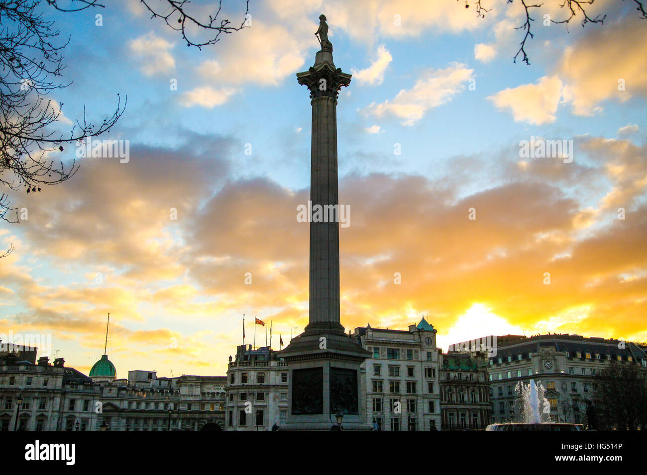 Trafalgar Square is lit up by a warm winter sunset Featuring ...