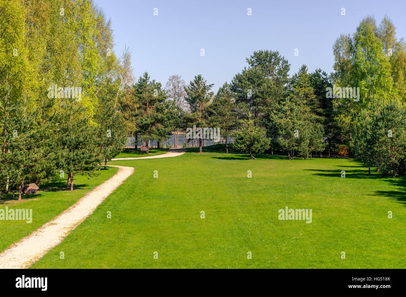 The pathway in the park in early spring Stock Photo - Alamy