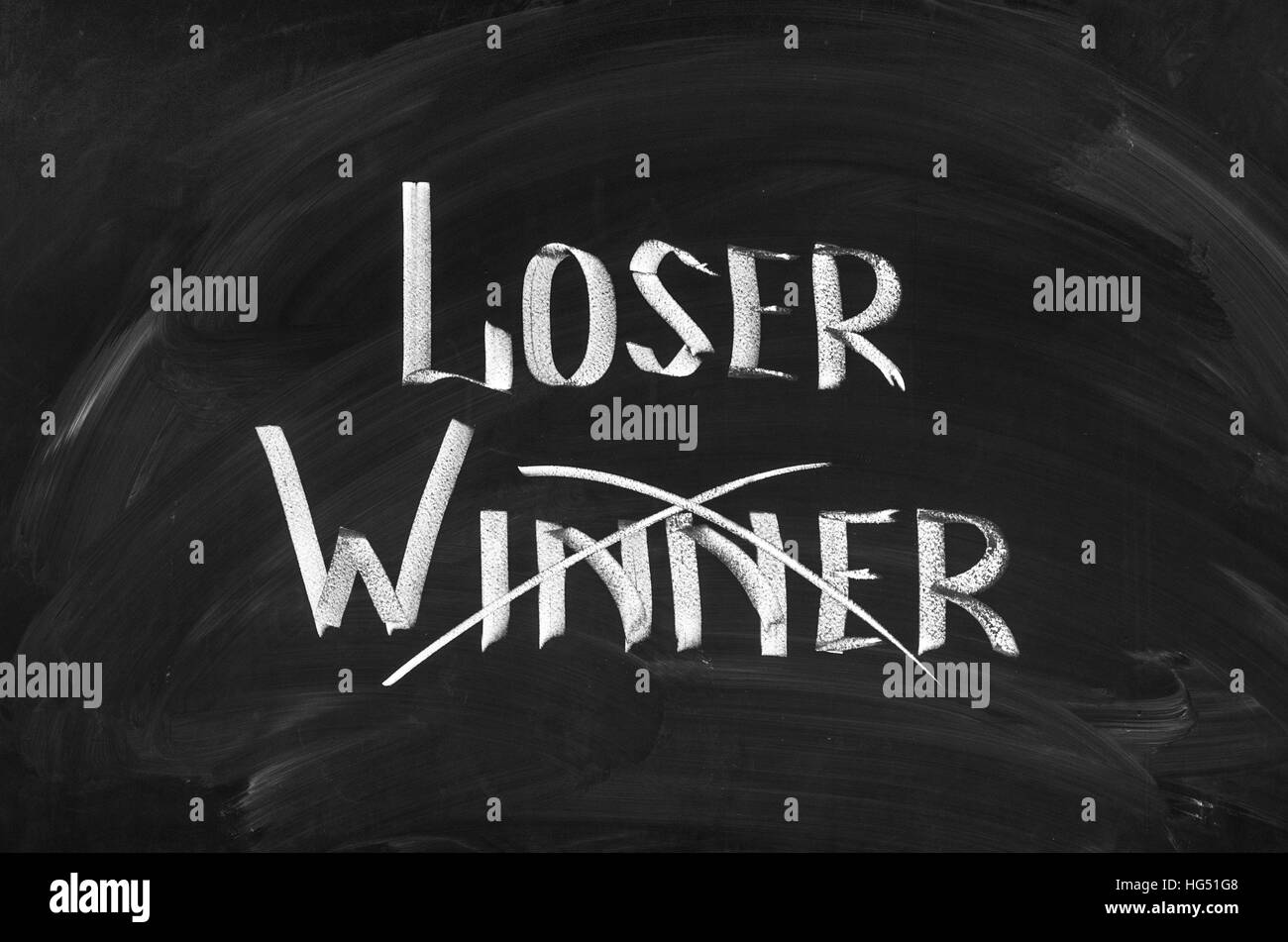 Loser and winner written on the blackboard with chalk Stock Photo - Alamy