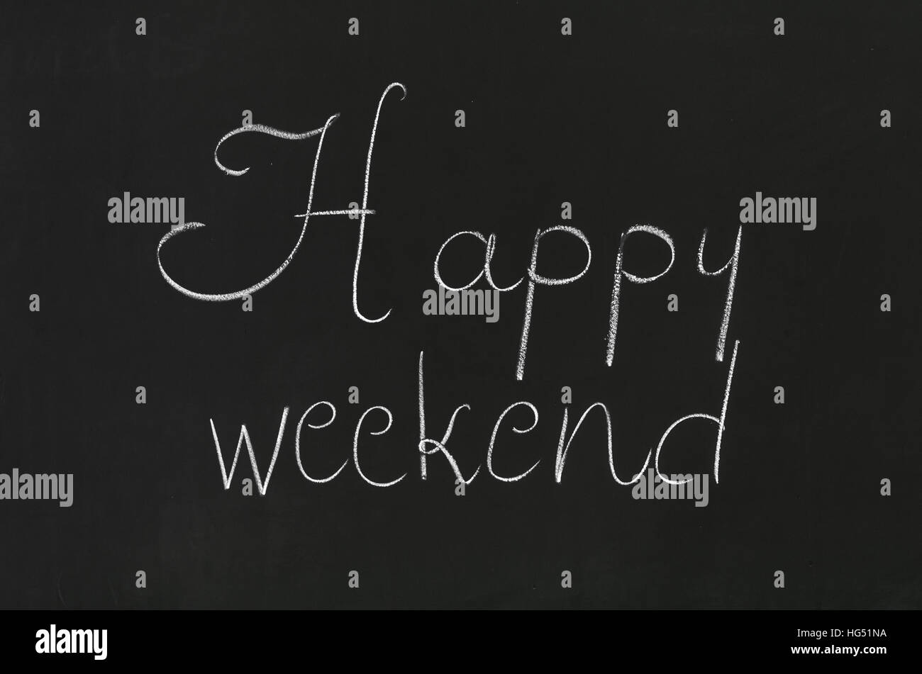 Happy weekend phrase handwritten on the school blackboard Stock Photo ...