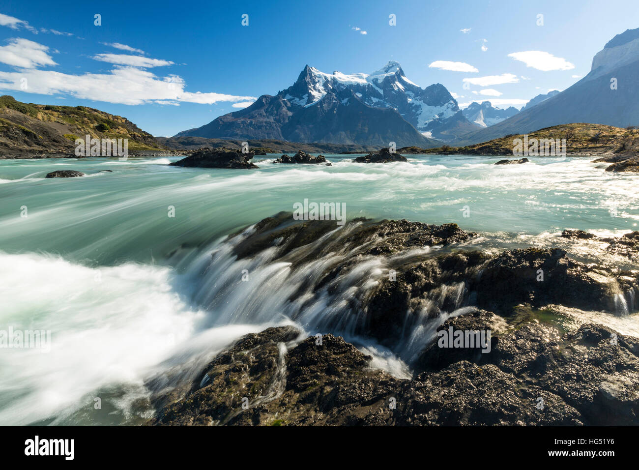 Whitewater rapids on the Rio Paine below Lake Nordenskjold. Cerro Paine ...