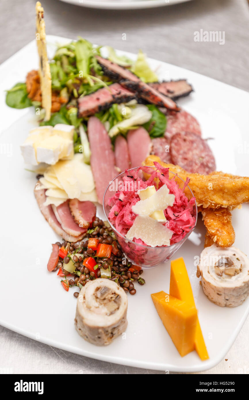 Appetizer served on a plate. Prepared by a professional chef Stock ...