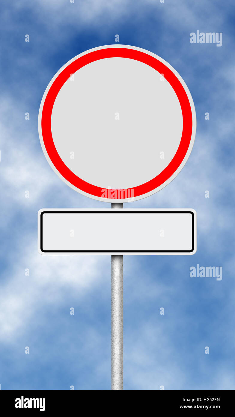 In the sky background empty warning road sign Stock Photo - Alamy
