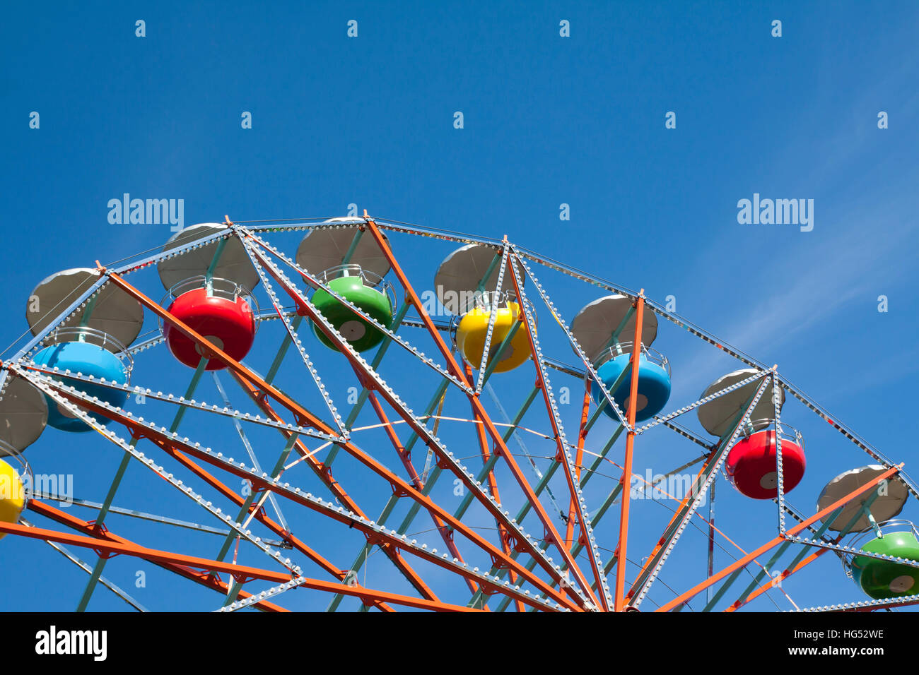 Ferris wheel on sky background in amusement park Stock Photo - Alamy
