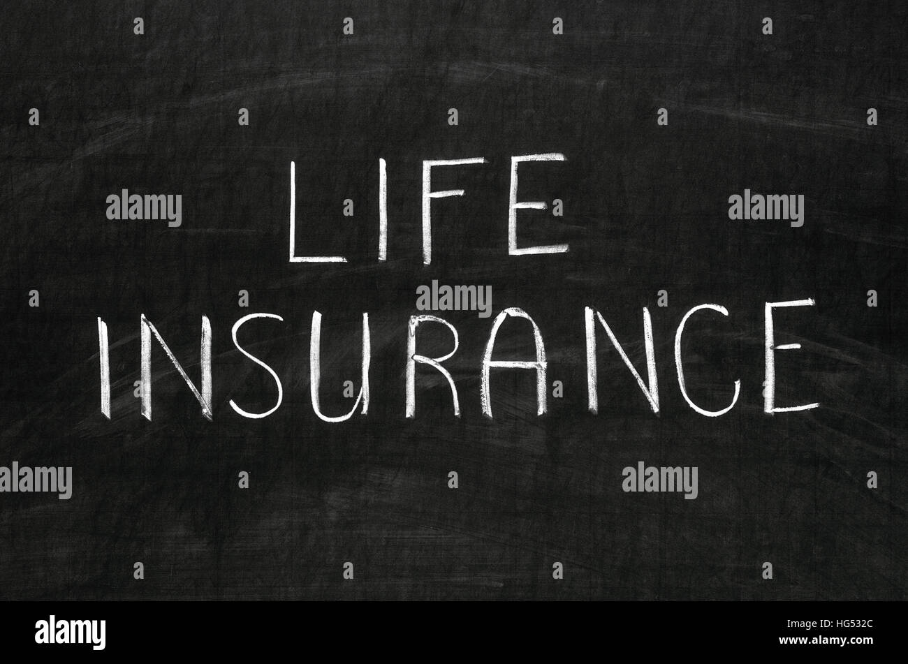 Life insurance message handwritten on the blackboard Stock Photo - Alamy