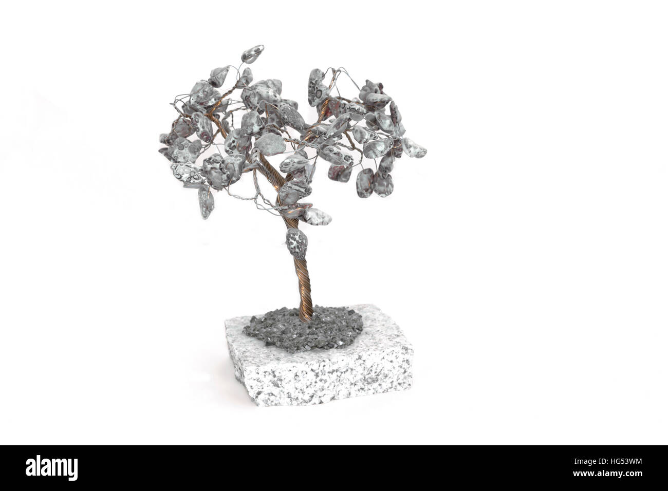 Lucky stone tree on a white background Stock Photo - Alamy