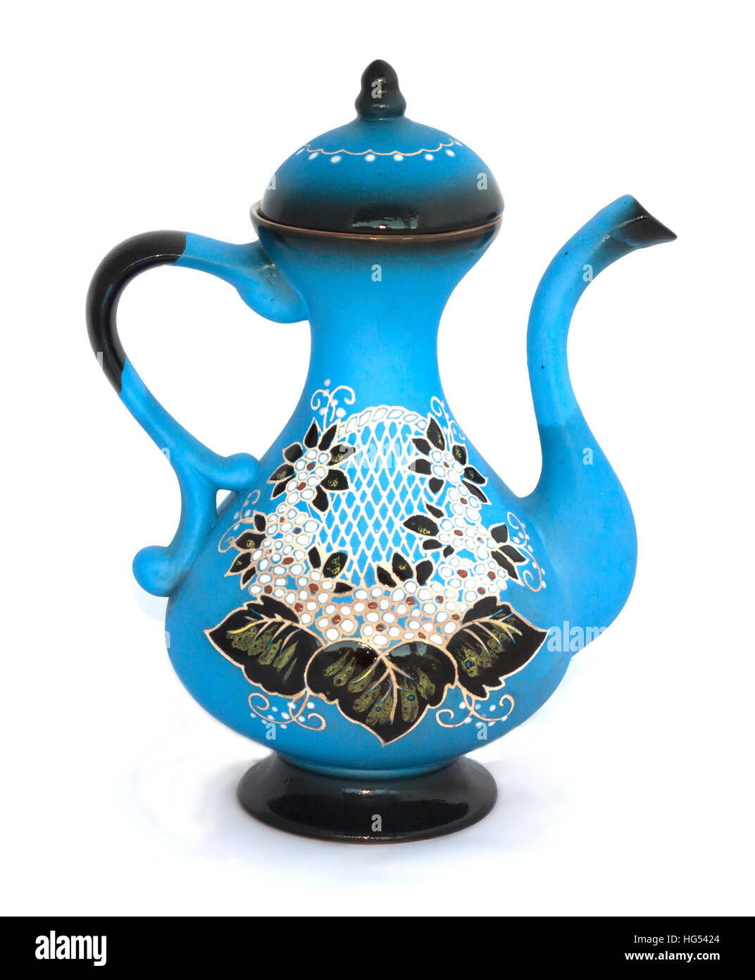 Blue kettle with flower decoration on a white background Stock Photo ...