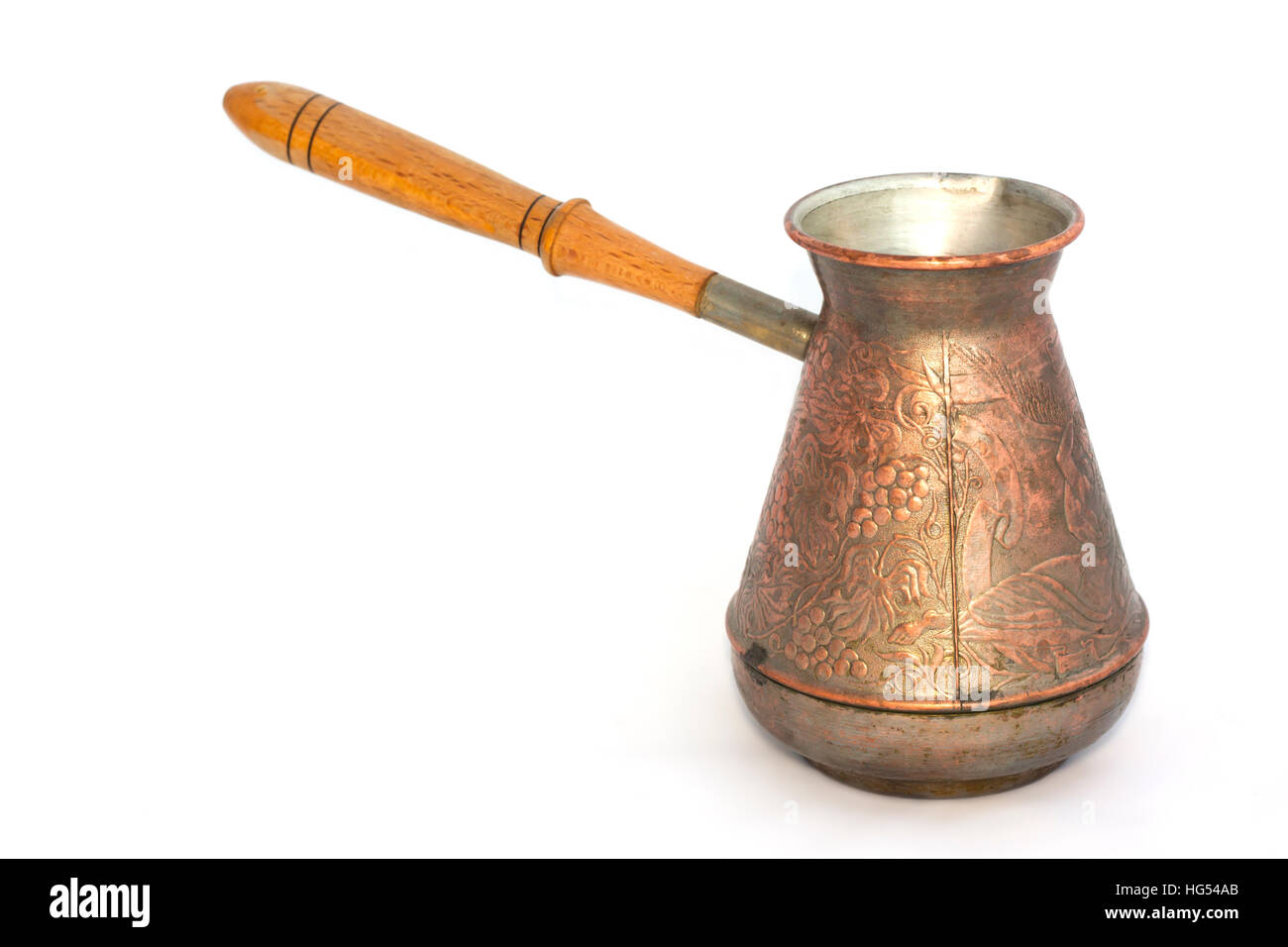 Old copper turk on a white background Stock Photo - Alamy