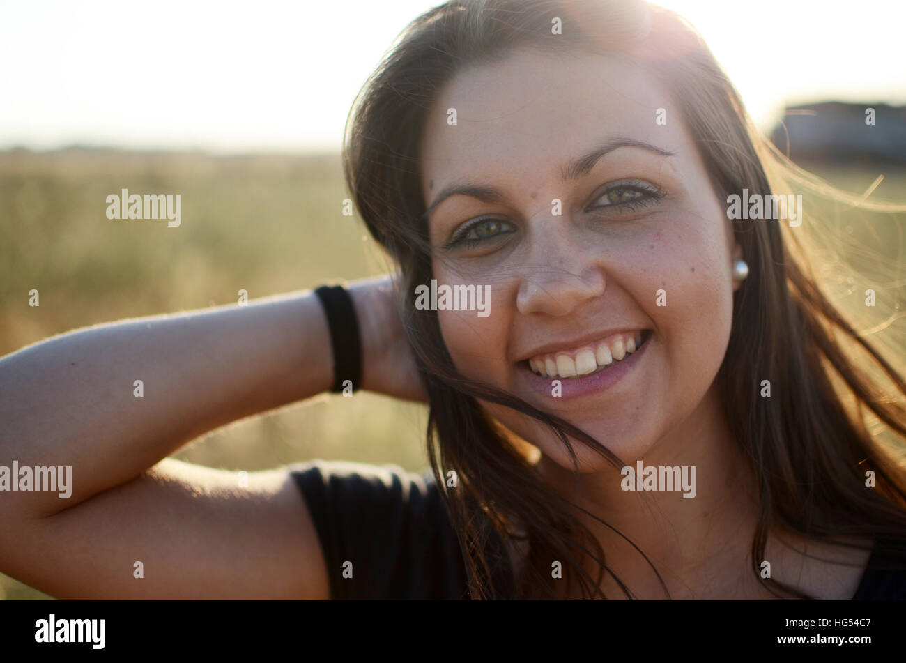 Exterior portrait of cute young woman Stock Photo - Alamy