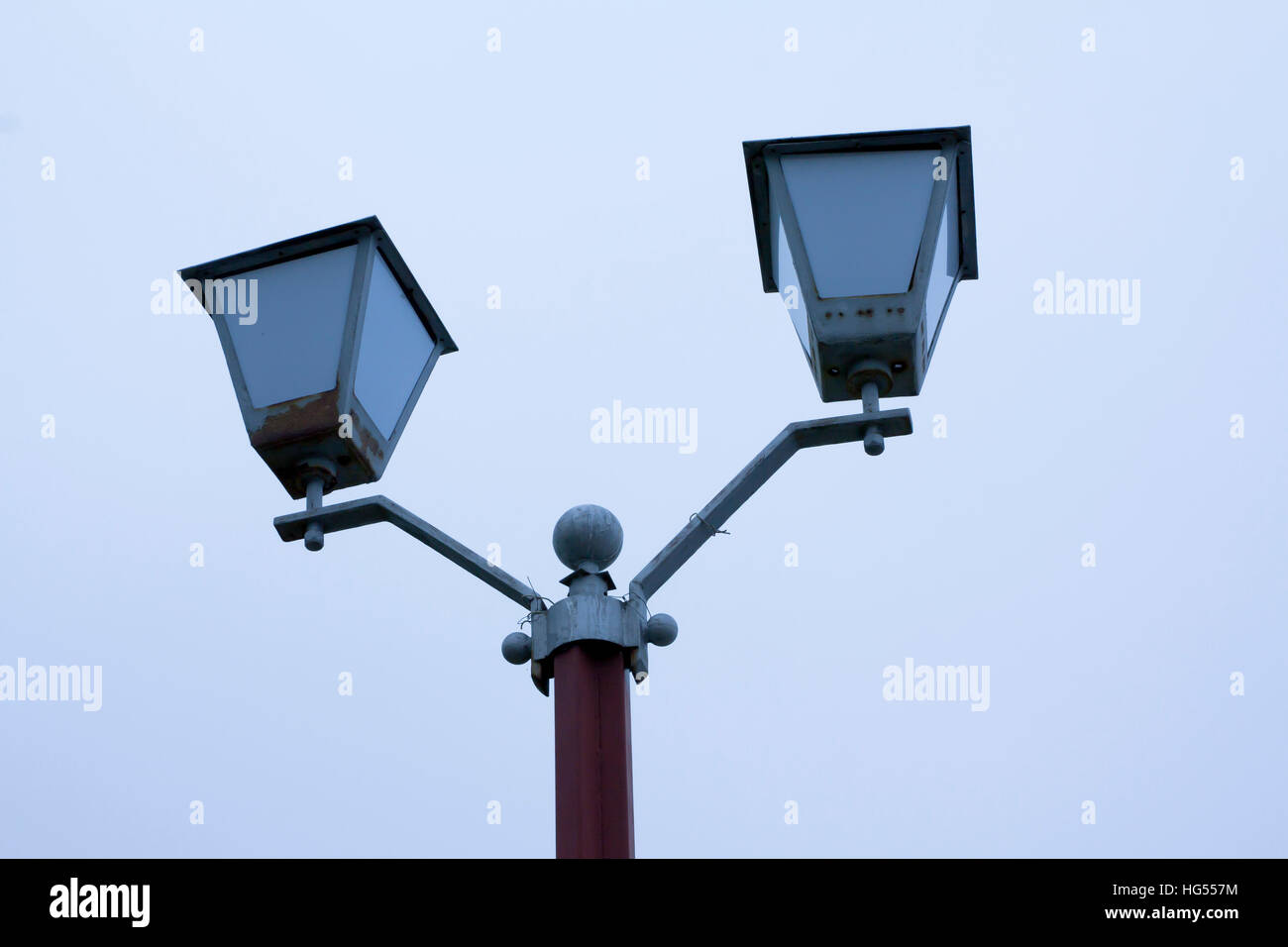 Old street light. Vintage street light on sky background Stock Photo ...