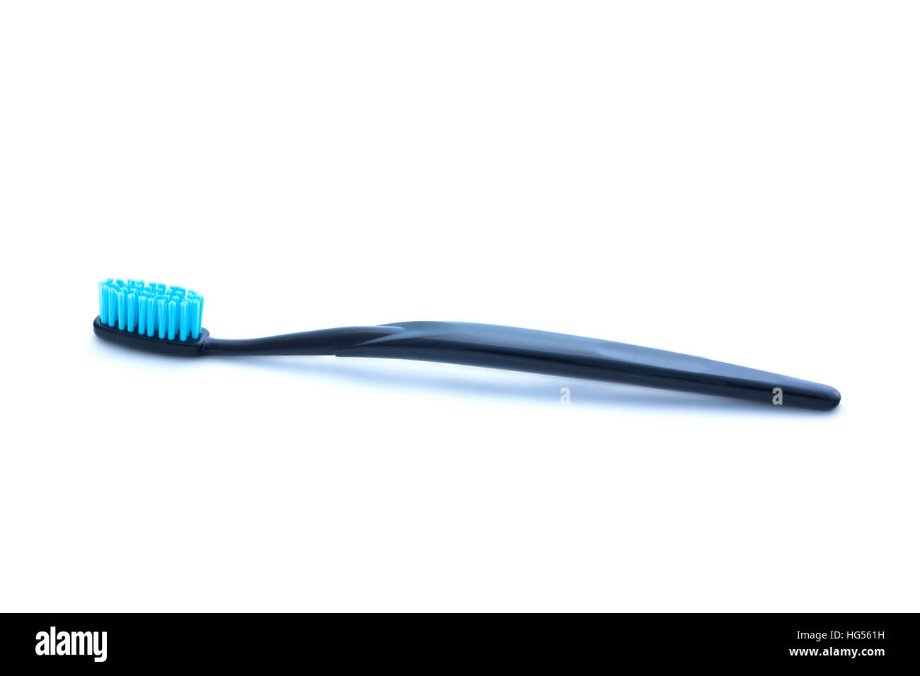 Black toothbrush on a white background, isolated Stock Photo - Alamy