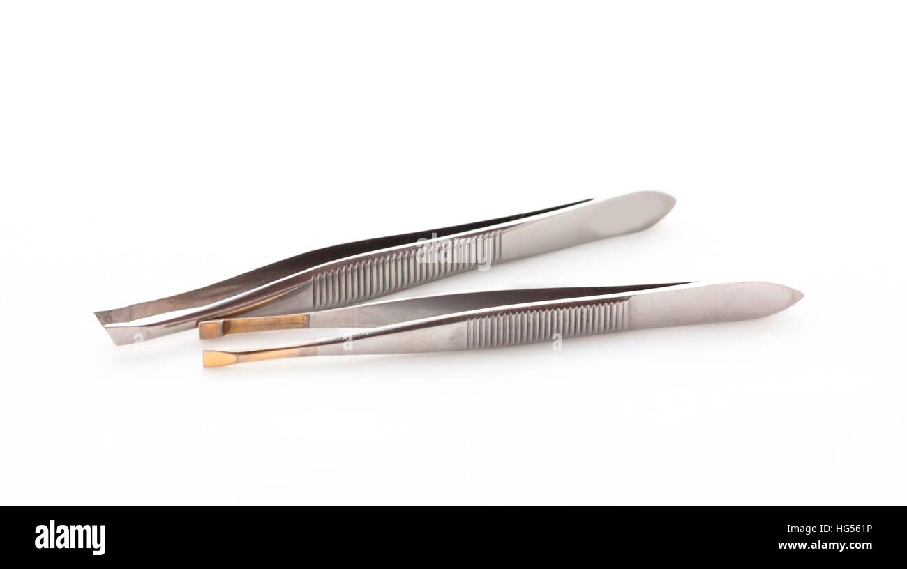 Two steel tweezers on a white background, isolated Stock Photo - Alamy
