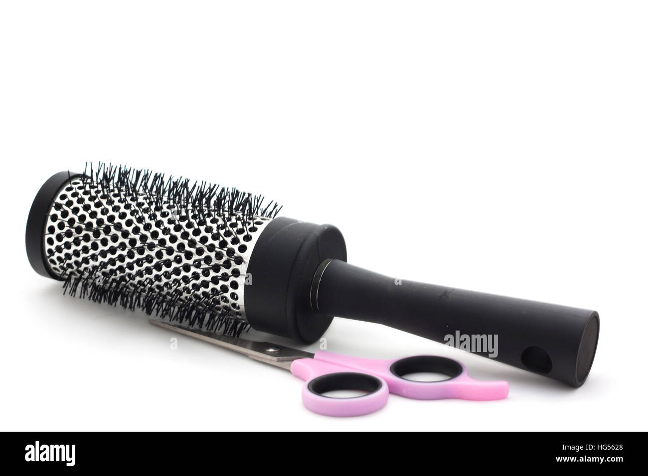 Barber scissors and a brush on a white background Stock Photo - Alamy