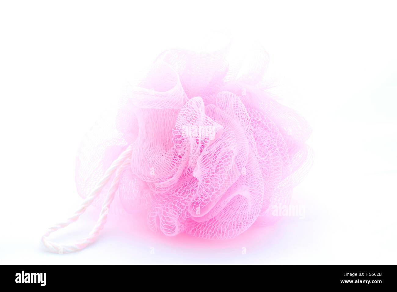 Pink sponge on a white background, isolated Stock Photo - Alamy