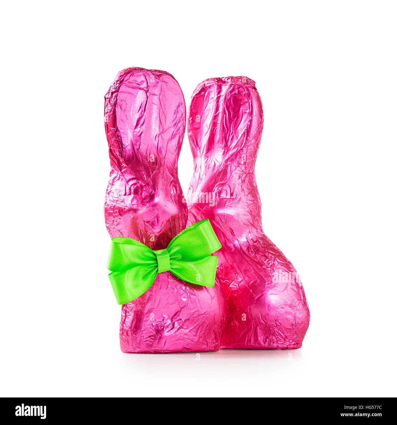 Pair of chocolate easter rabbits, two sweet bunnies with bow wrapped in ...