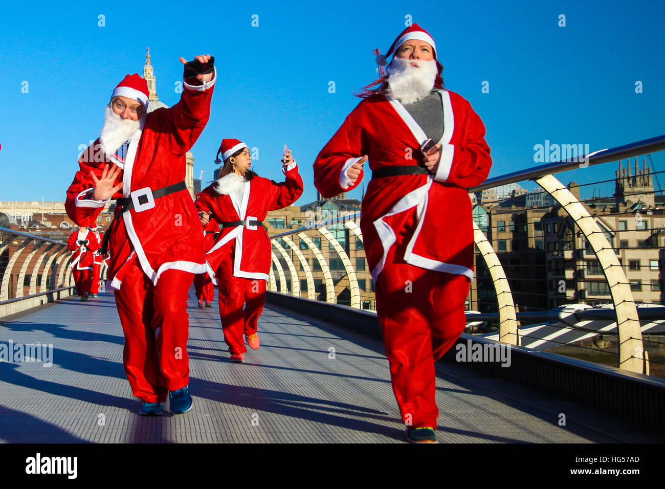 Hundreds of Santa's participate in Santa in the City outside St Paul's ...
