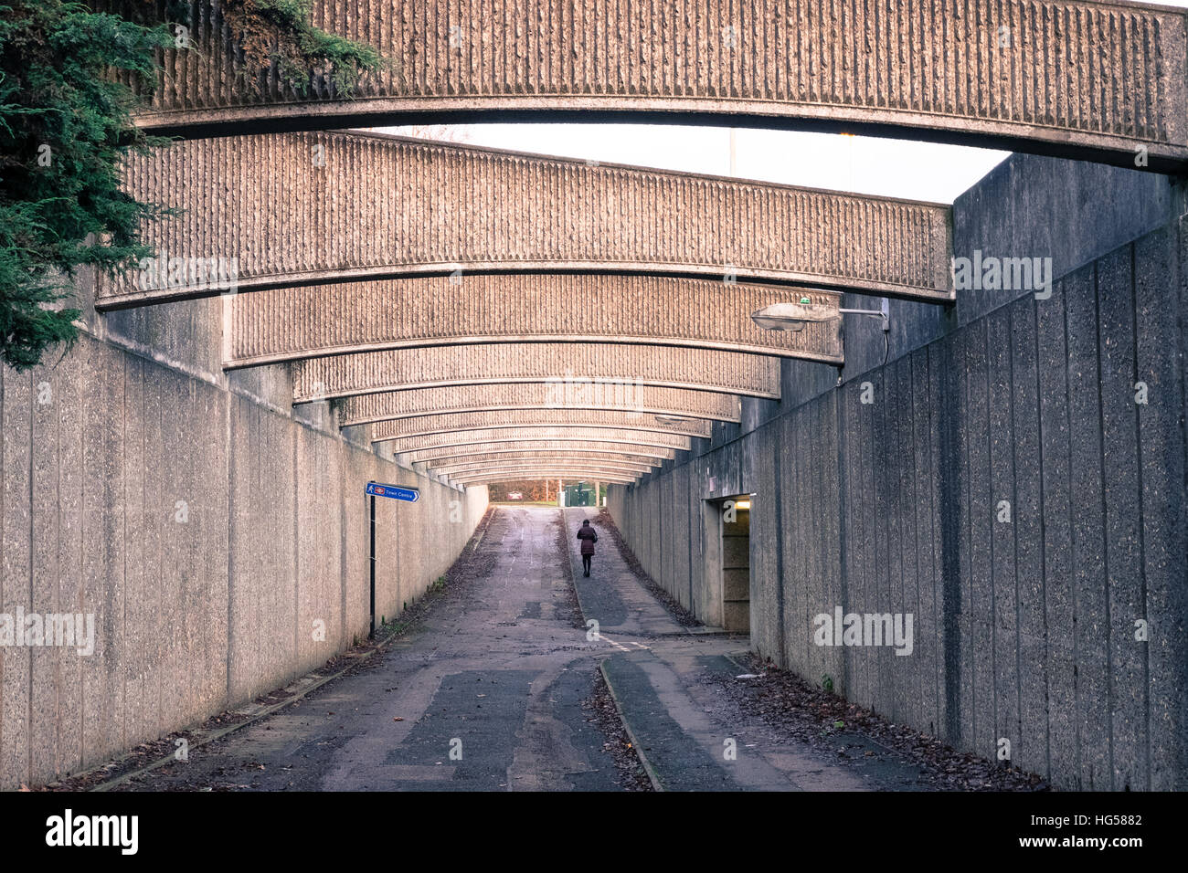 Women walks to work on urban pathway Stock Photo - Alamy