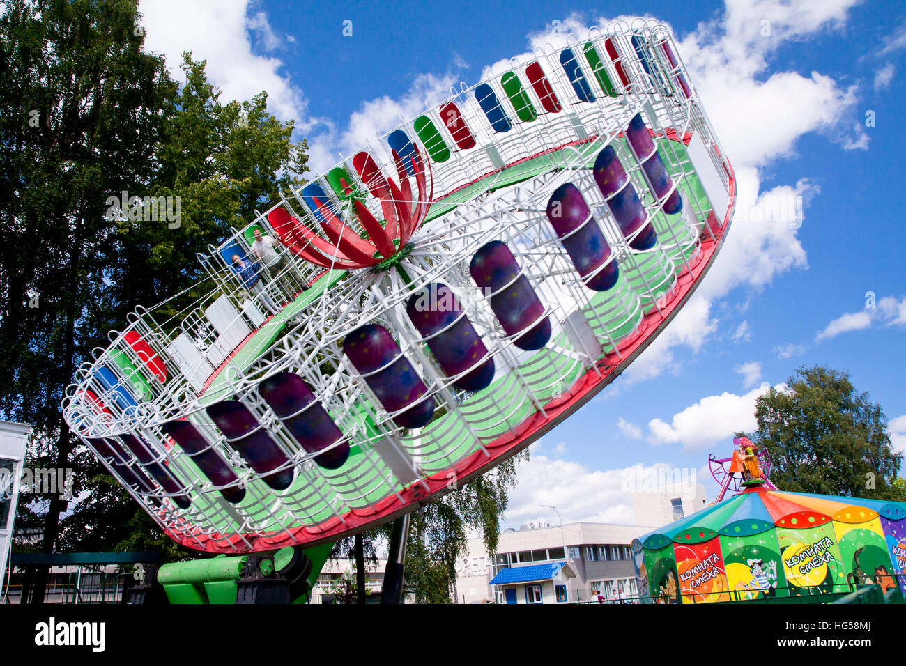 Carousel in an amusement park on sky background Stock Photo - Alamy