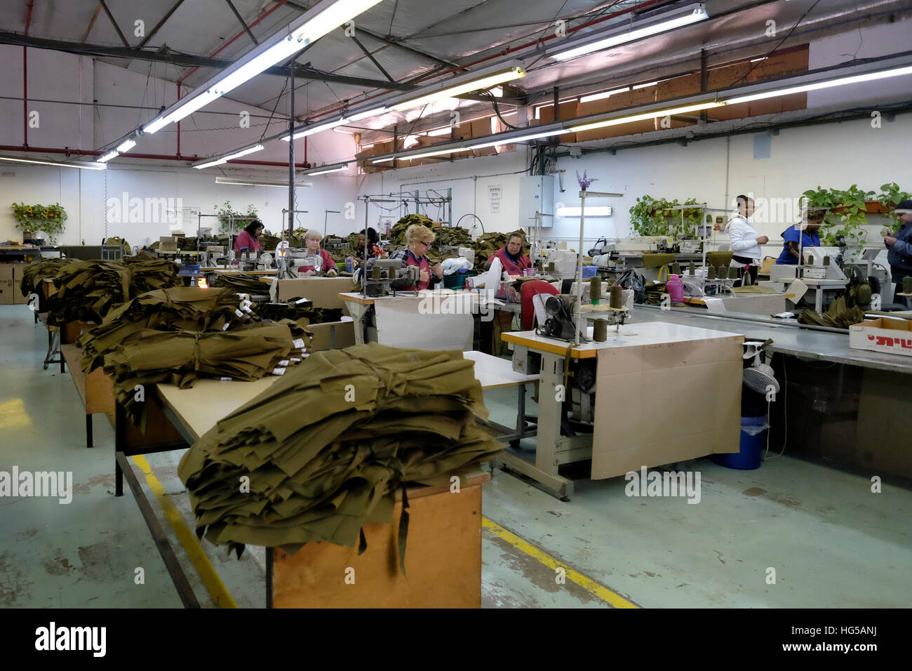 Israeli women sewing military uniforms for the IDF Israeli army in ...