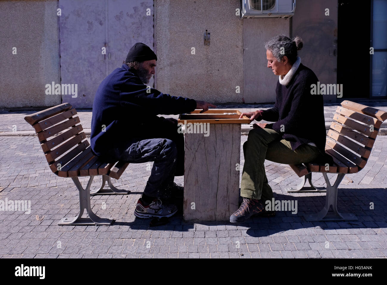 Locals playing Shesh Besh backgammon board game in Mitzpe Ramon a town ...