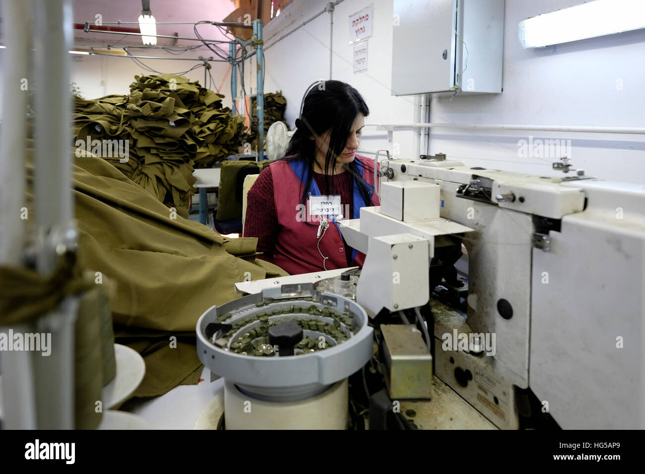 Israeli women sewing military uniforms for the IDF Israeli army in ...