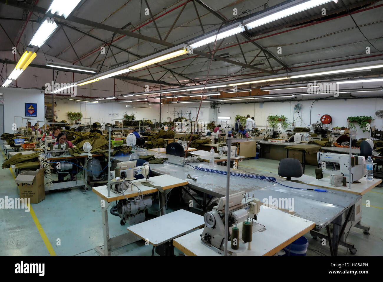 Israeli women sewing military uniforms for the IDF Israeli army in ...