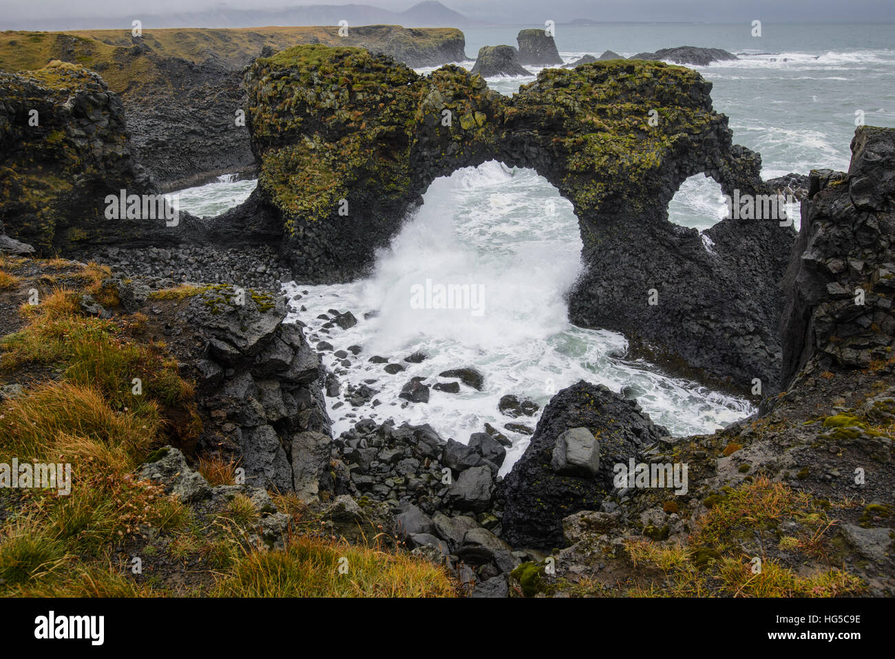 Gatklettur basalt rock arch on the Snaefellsness Peninsula, Iceland ...