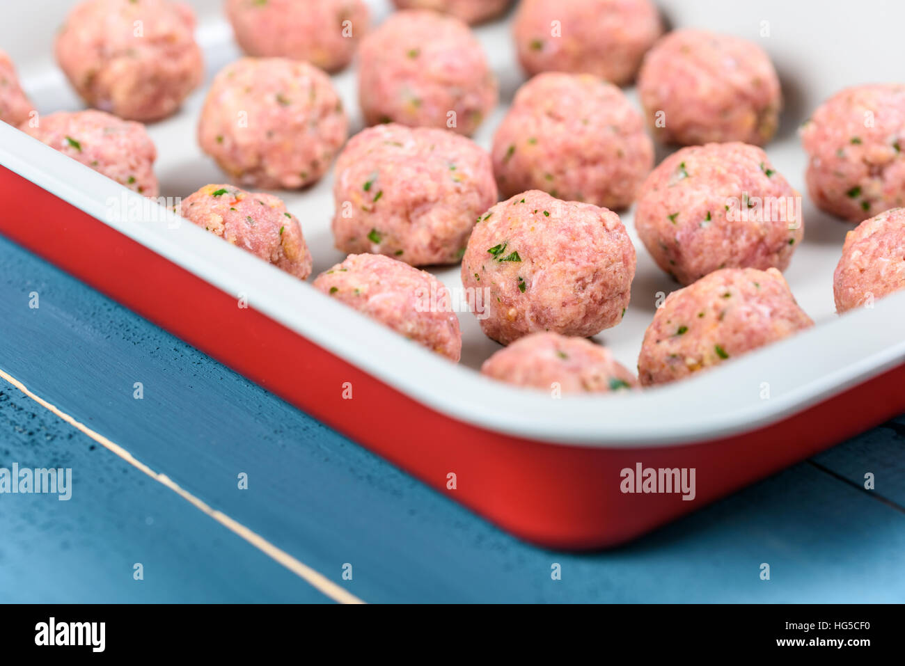 Preparing Raw Meatballs In Pan Stock Photo - Alamy