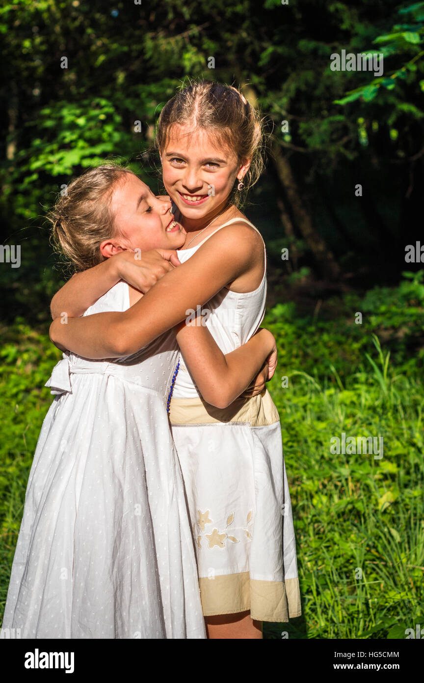 Beautiful happy family two daughters hi-res stock photography and ...
