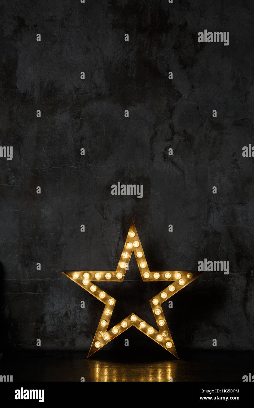 Star in black photo studio Stock Photo - Alamy