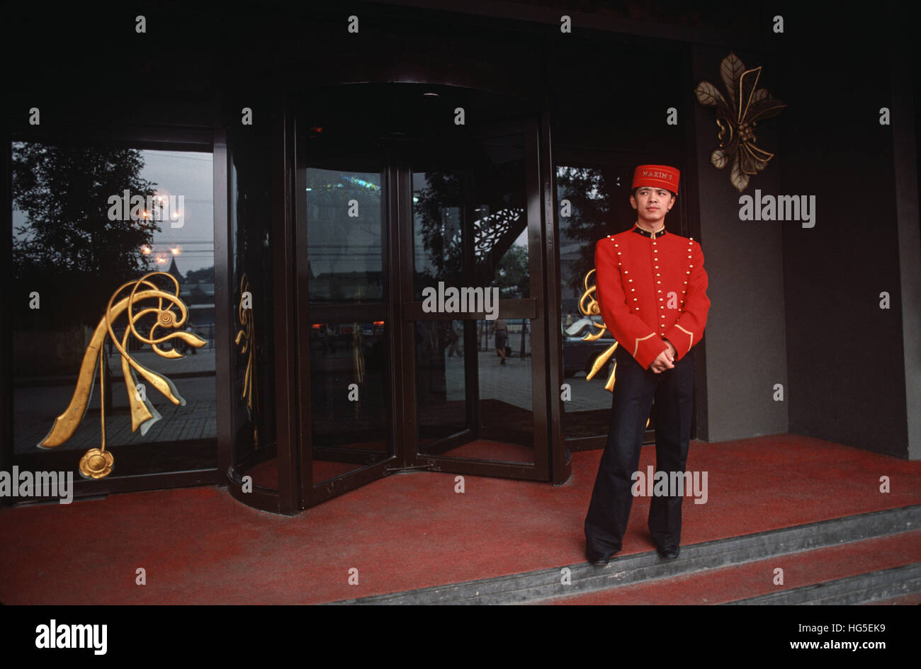 Chinese doorman in front of newly opened French restaurant Maxim's ...
