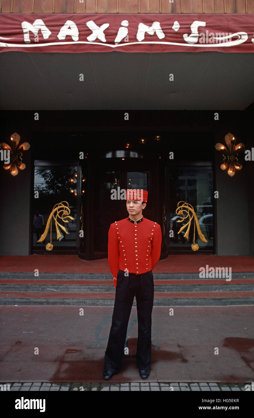 Chinese doorman in front of newly opened French restaurant Maxim's ...