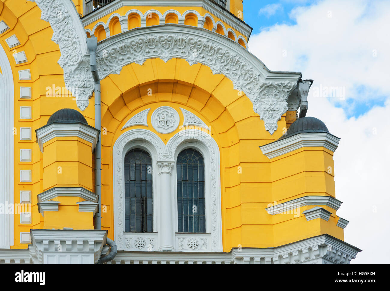 yellow church building with windows and pillars Stock Photo - Alamy
