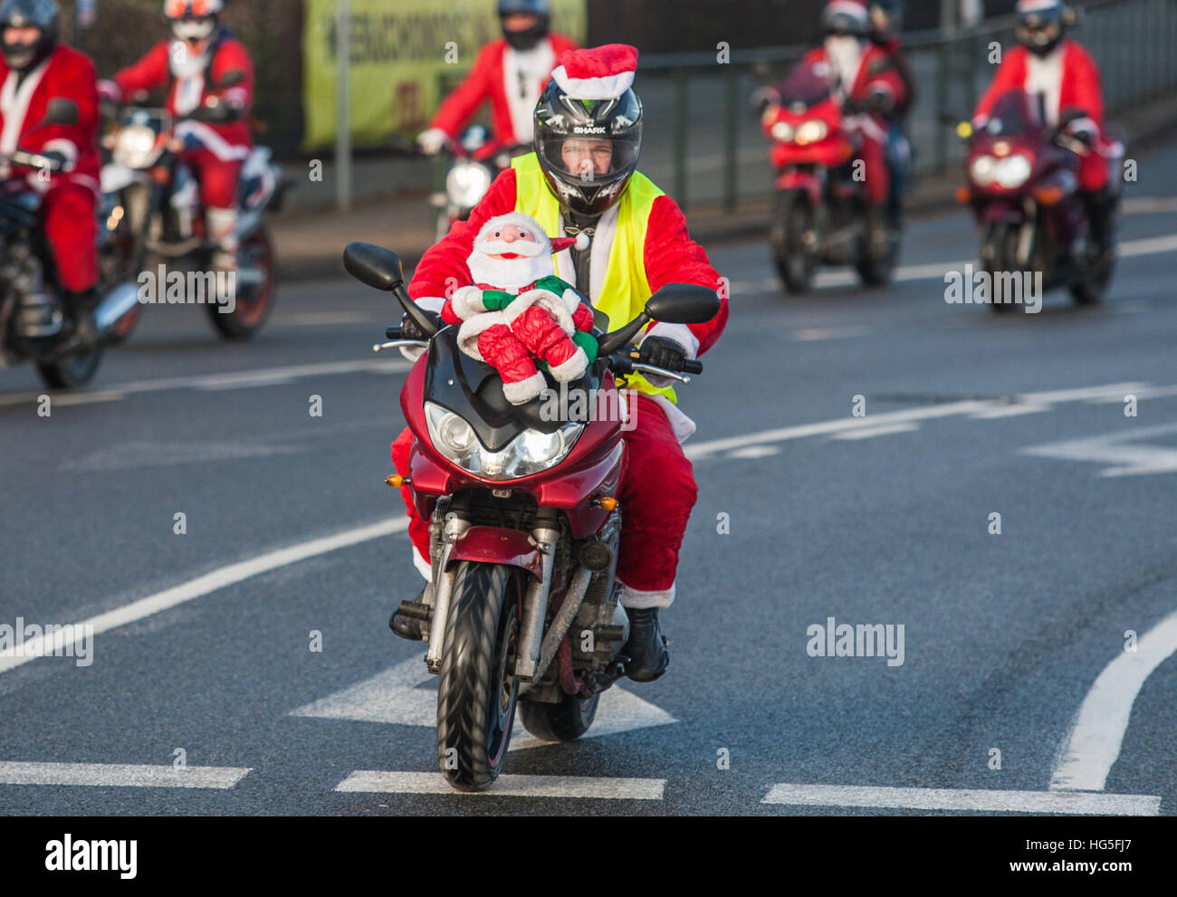 Thousands of Santa's on motorcycles parade through Gdansk, Poland ...