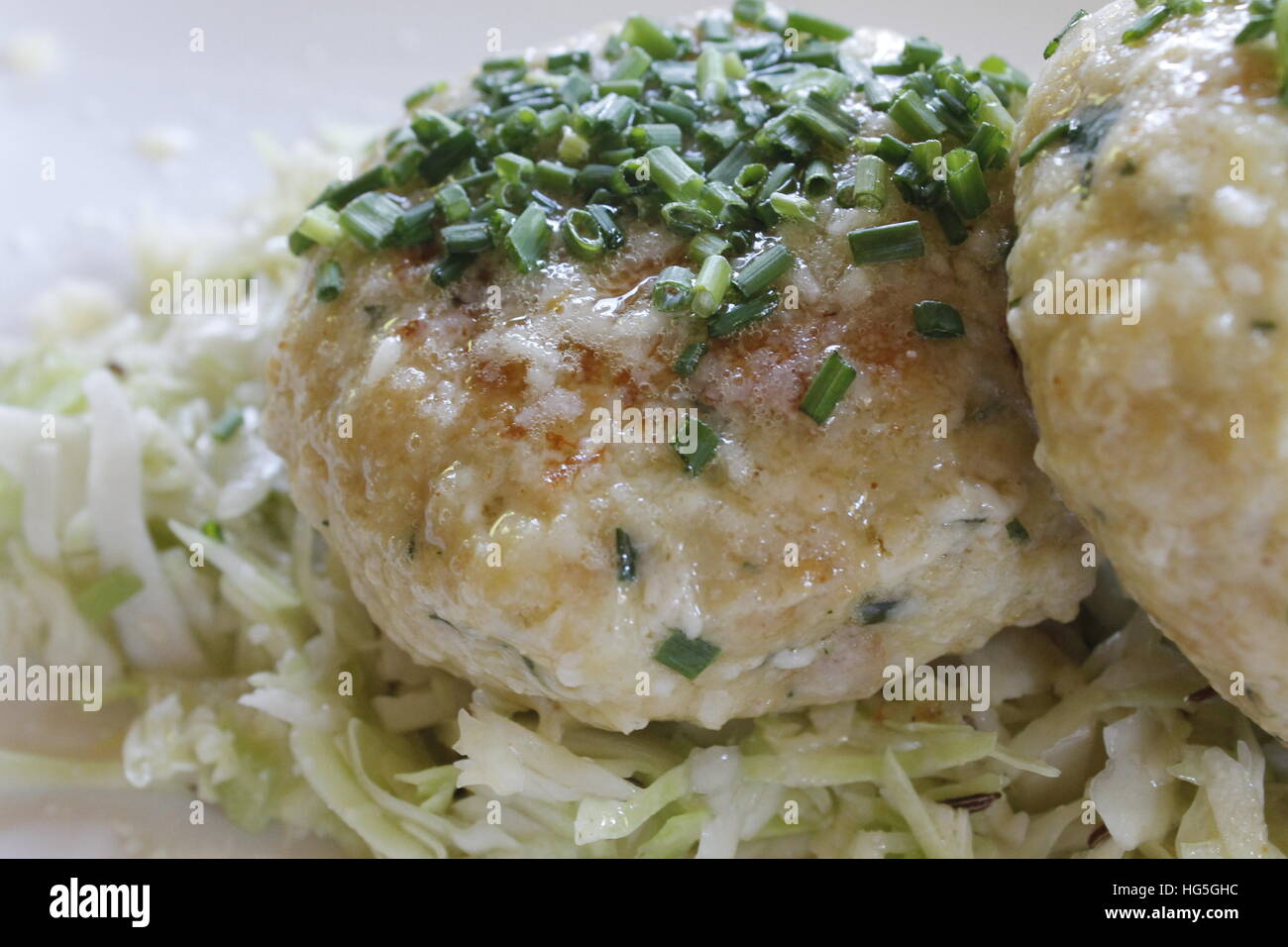 Tyrolean traditional dish, knodel or canederli with parsley Stock Photo ...