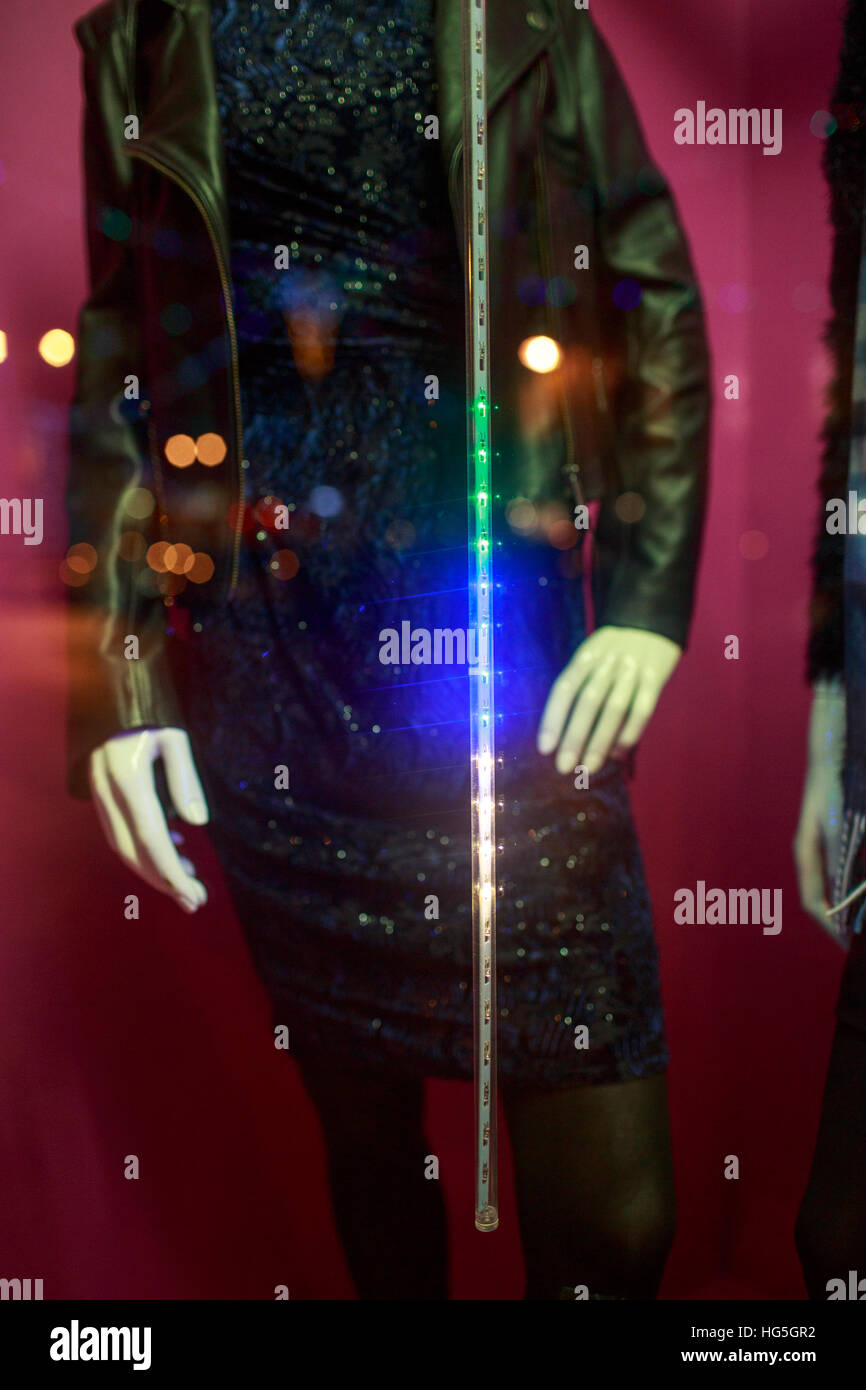A high Street shop window, decorated for christmas with display of ...