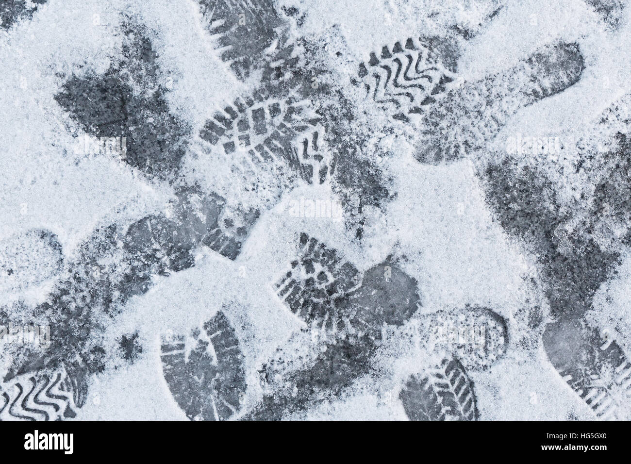 winter background with footprints on snow Stock Photo - Alamy