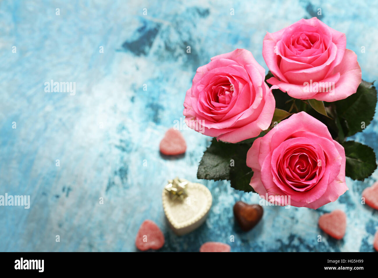 Pink flowers of roses and candy hearts for Valentines holiday Stock ...