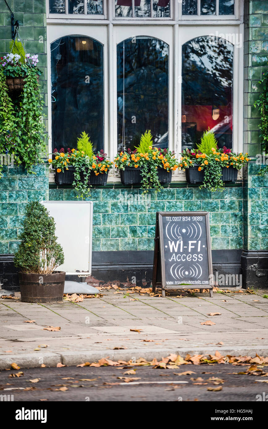Pub offering free wi-fi, London Stock Photo - Alamy