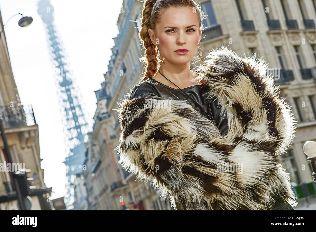 Boiling hot trendy winter in Paris. modern fashion-monger in fur coat ...