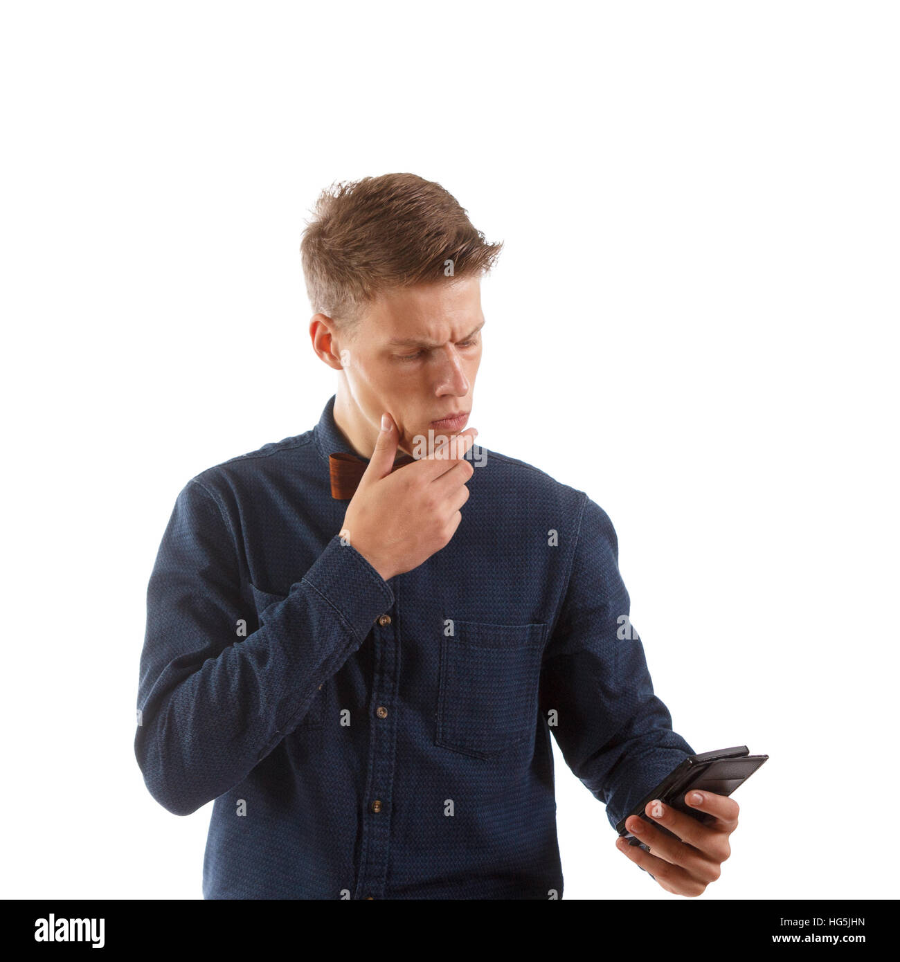 Man looking at his phone Stock Photo - Alamy